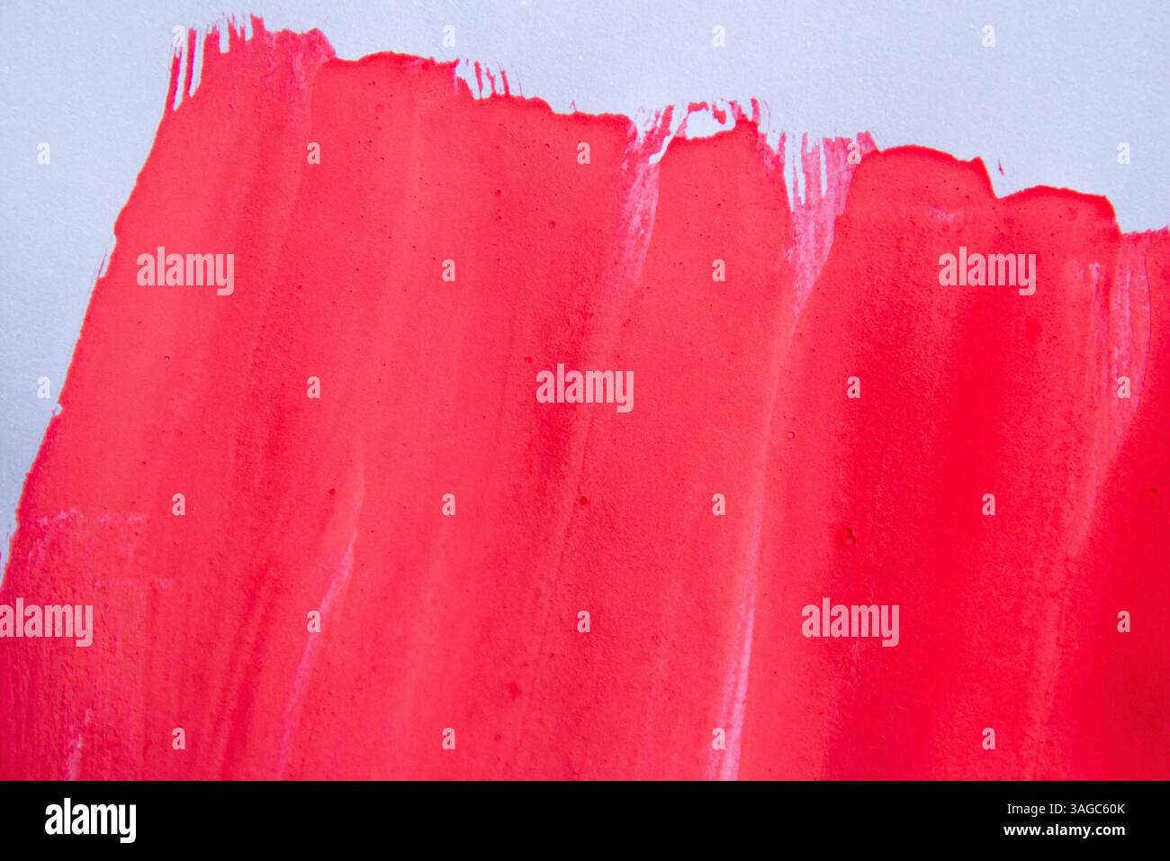 Bright and textured watercolor background in vibrant shades of red ...