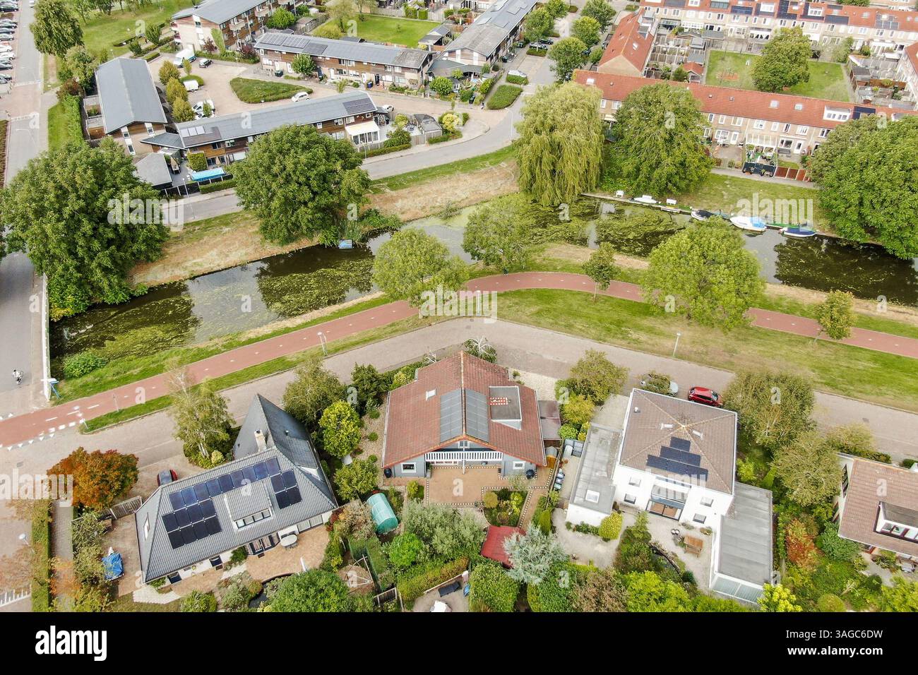 Sprawling residential neighborhood showcasing houses along a serene ...