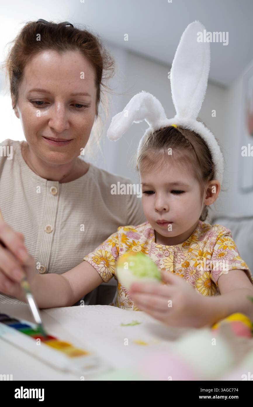 A delightful and joyful moment of creativity between a loving mother ...