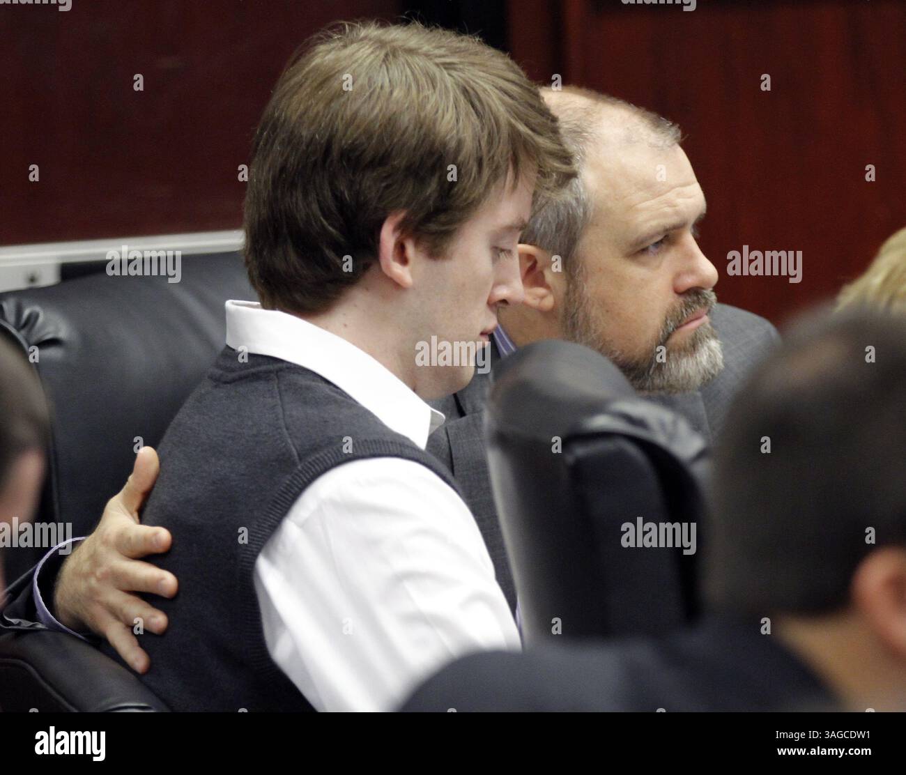 May 22, 2012 - Raleigh, NC, USA - Jason Williford, left, is consoled by Michael Driver, one of ...