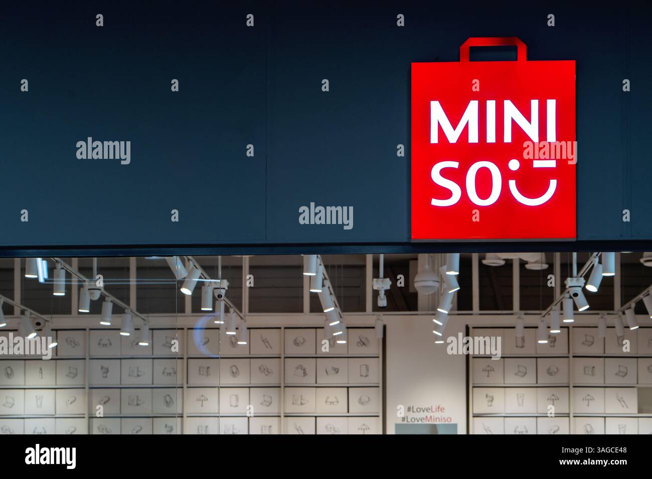 Miniso brand logo. The signboard Miniso store. Miniso is a Chinese low ...
