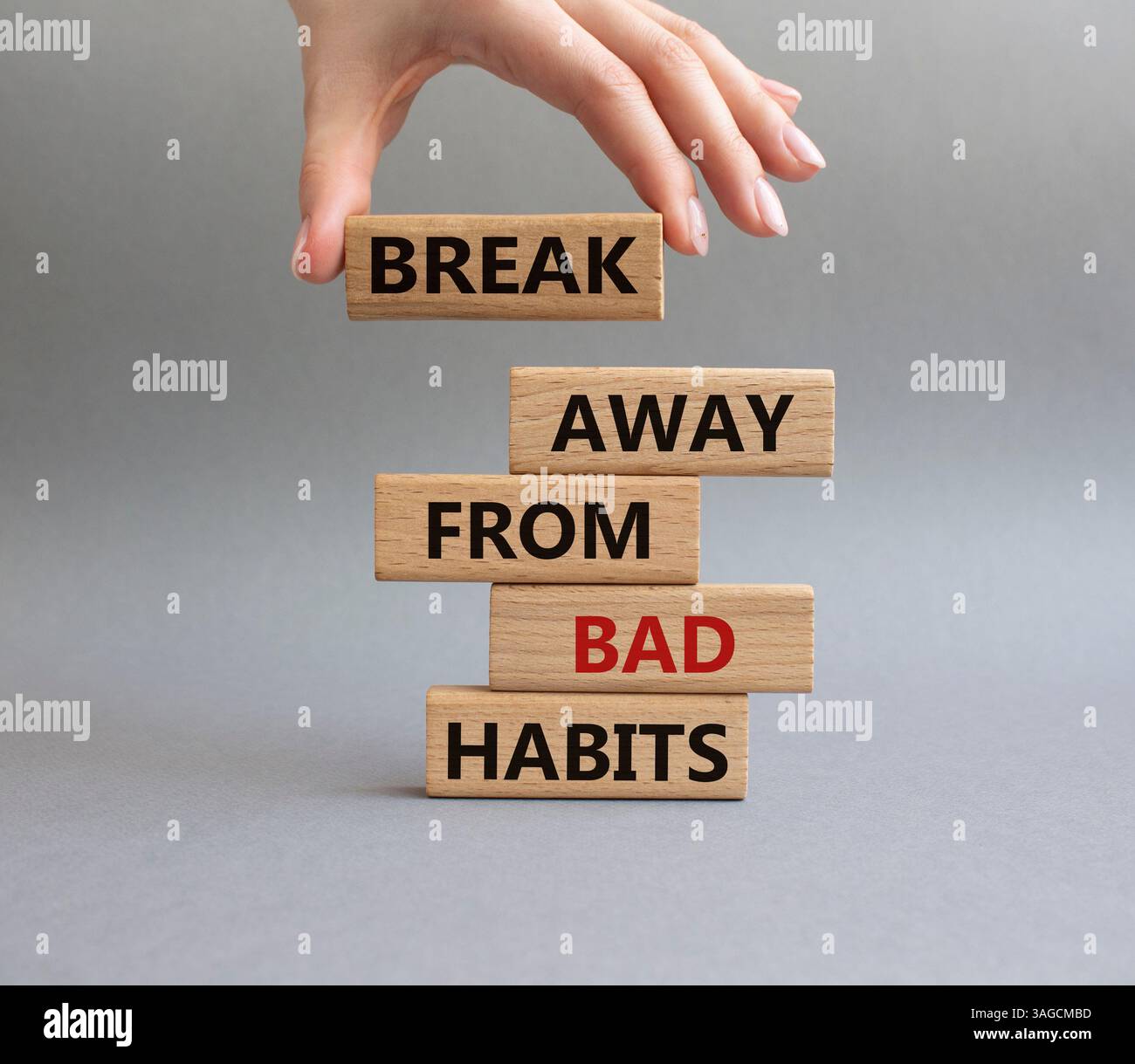 Break away from bad habits symbol. Wooden blocks with words Break away ...