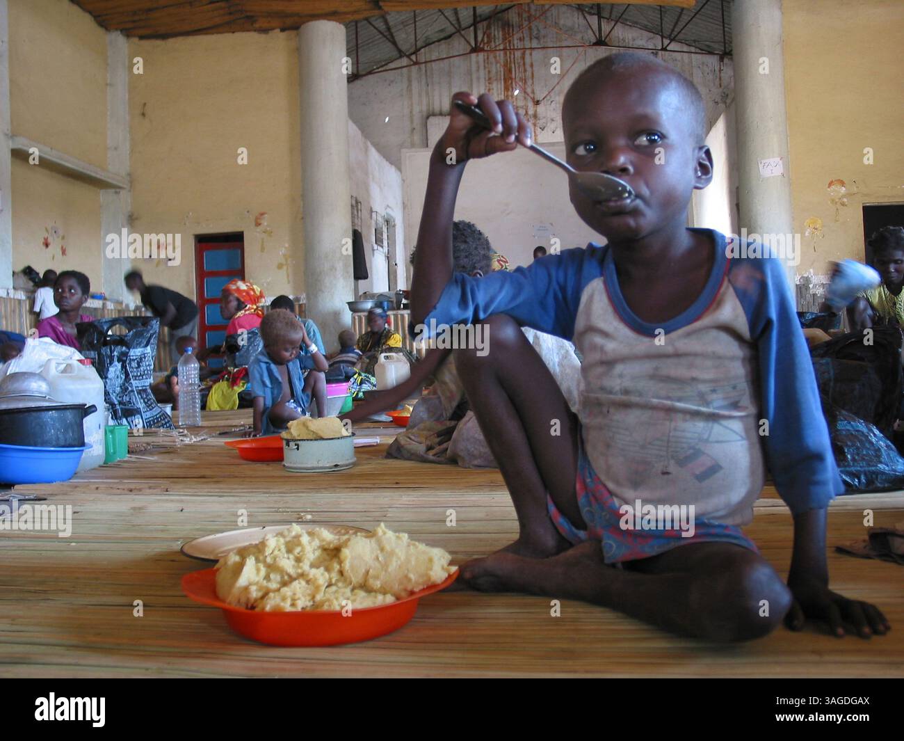 Malnourished child eat hi-res stock photography and images - Alamy