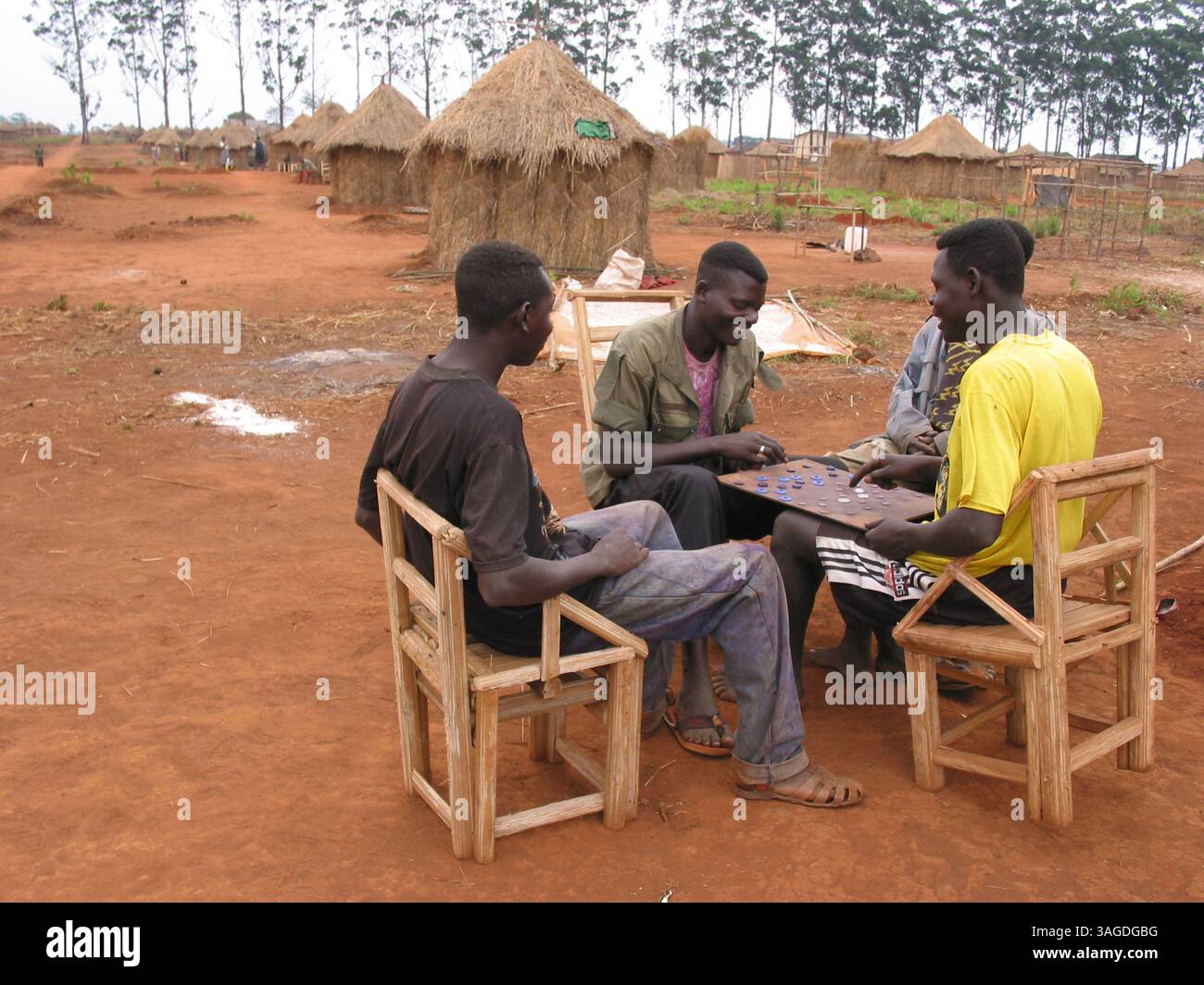 Jan 17, 2009 - Angola - Men play a game in a village in Angola. Feeding ...