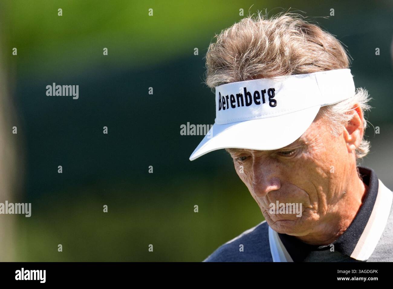 Bernhard Langer, of Germany, arrives to the practice green during a ...