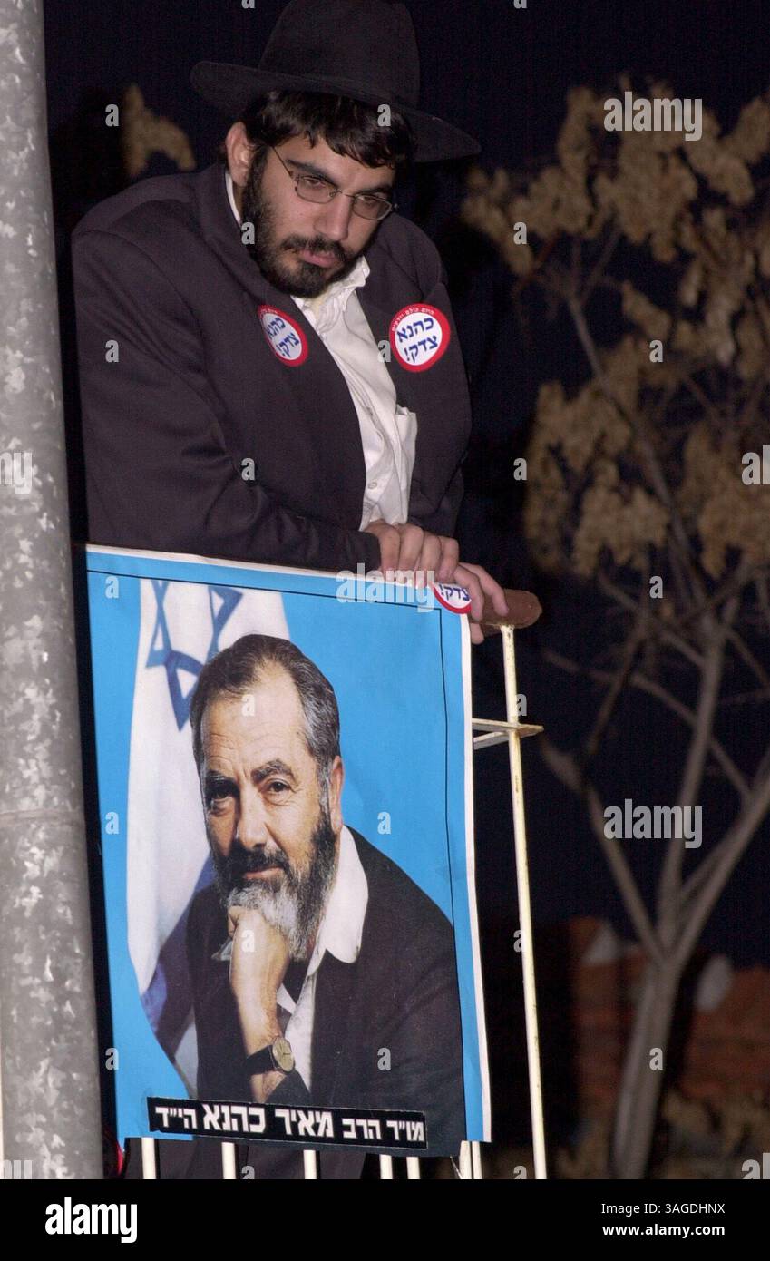 Dec 31, 2000; Jerusalem, Israel; A man stands behind a poster of the ...