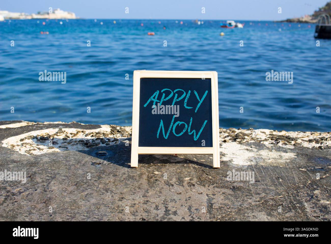 Apply now symbol. Concept word Apply now on black chalk blackboard ...