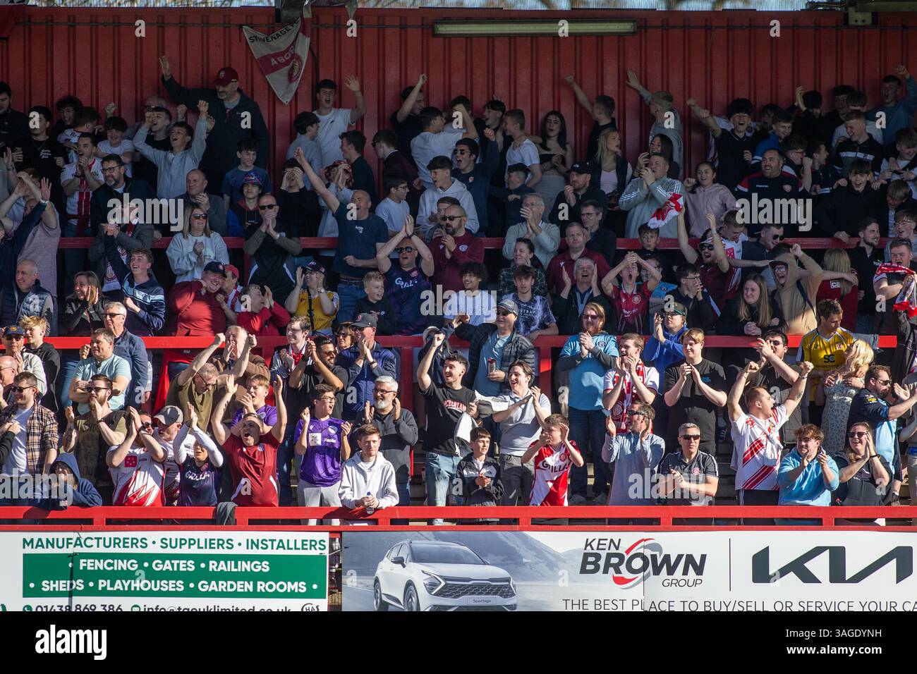 wide view of football fans and supporters standing on traditional ...