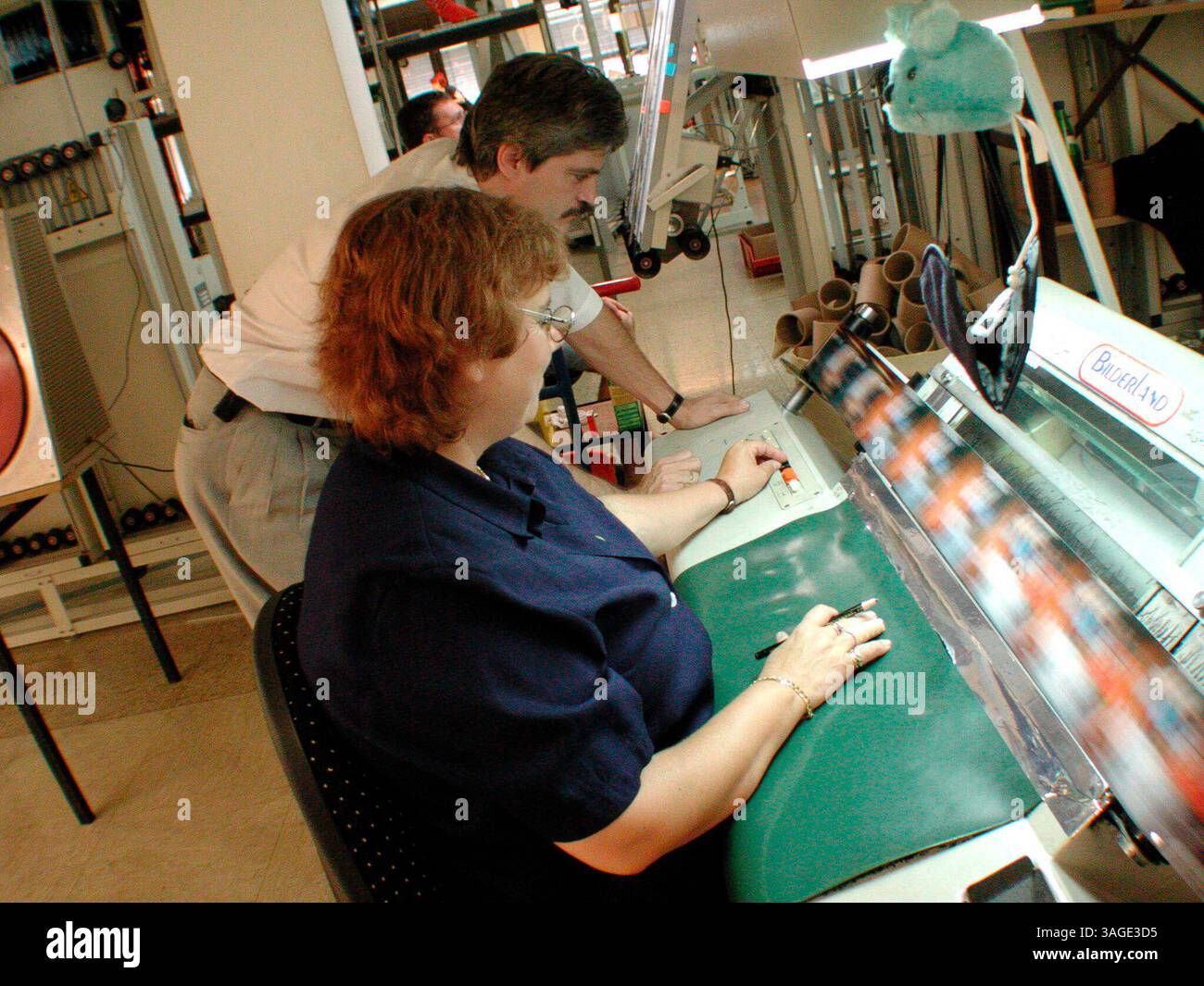 a photo lab working with analog pictures a photo lab with analog ...