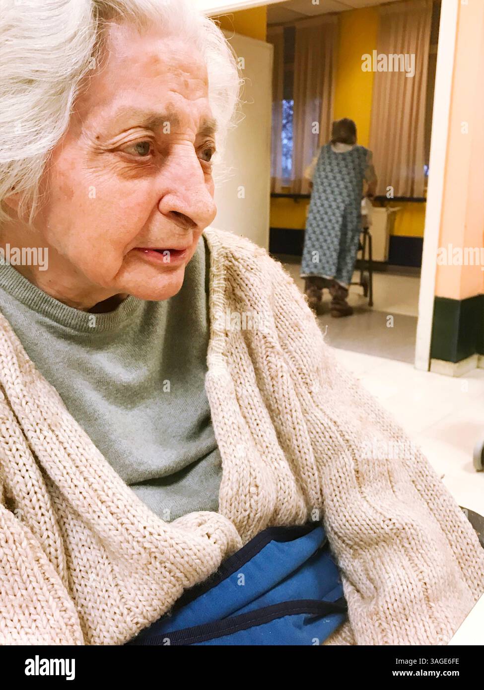 Elderly woman in a nursing home Stock Photo - Alamy