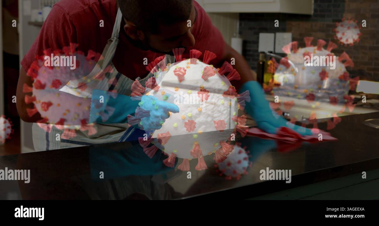 Man cleaning kitchen counter with gloves, focusing on hygiene during ...