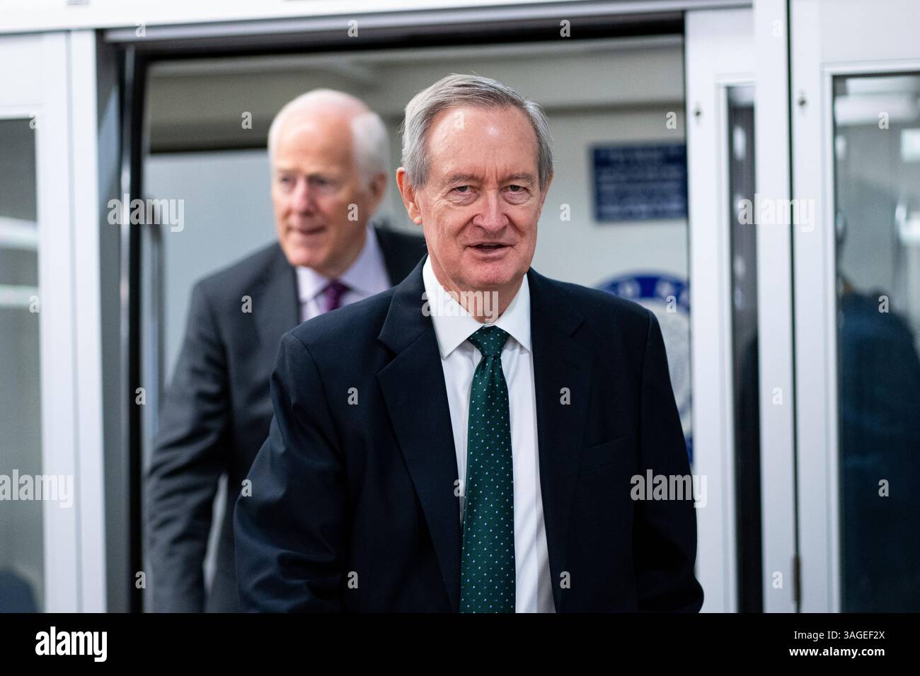UNITED STATES - APRIL 8: Sen. Mike Crapo, R-Idaho, followed by Sen ...
