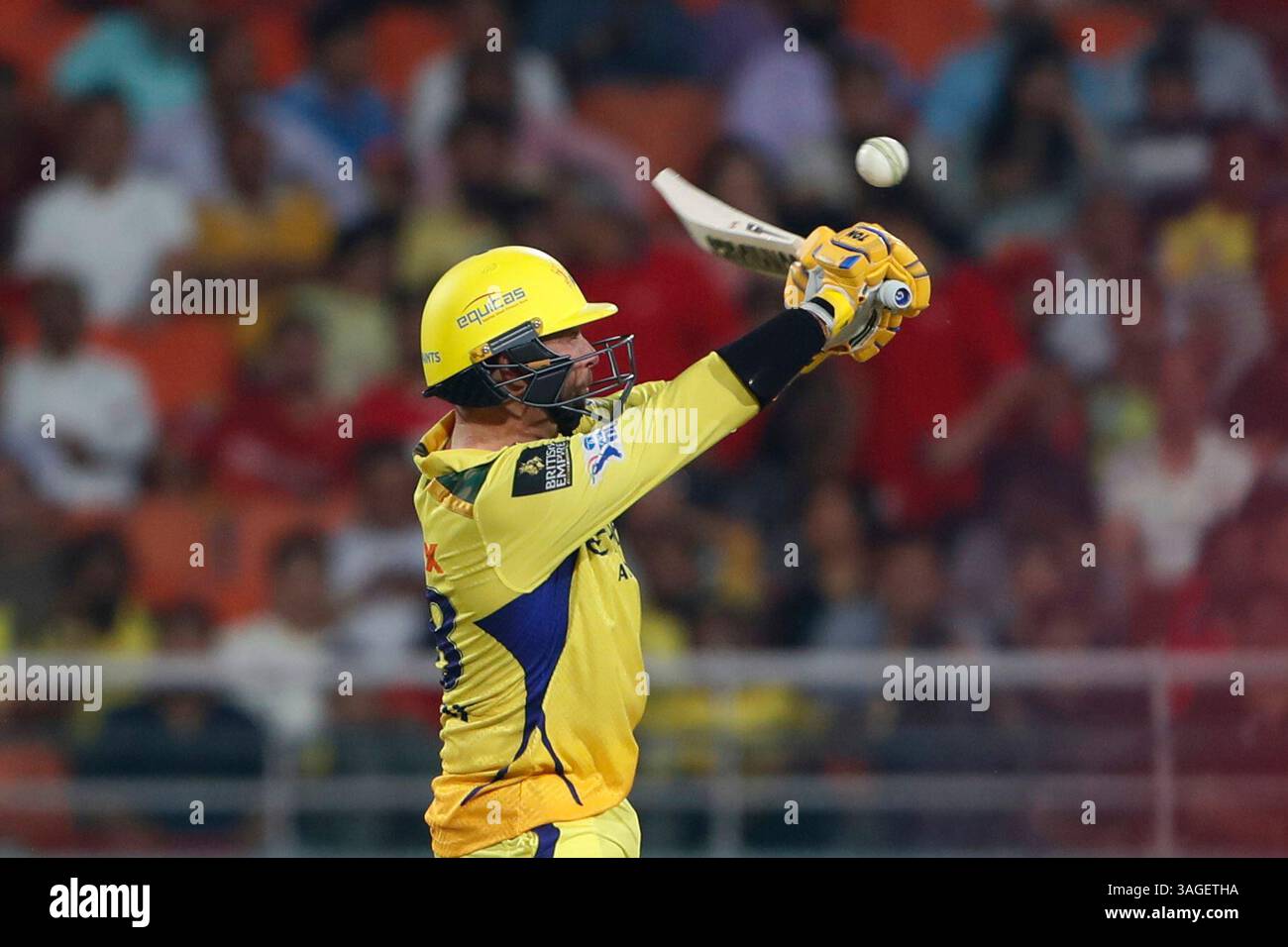 Chennai Super Kings' Devon Conway plays a shot during the Indian Premier League cricket match ...