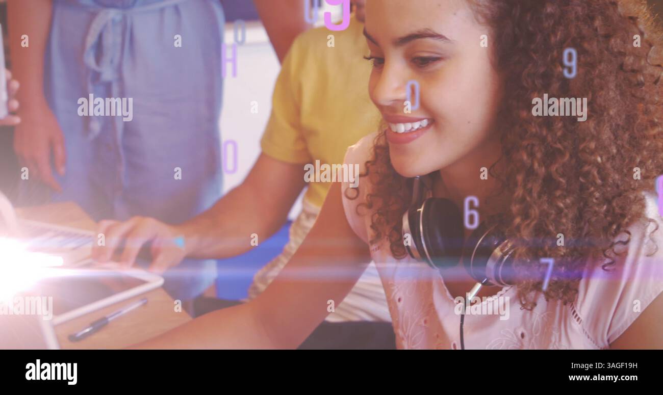 Image of numbers letters and changing over students using computers ...