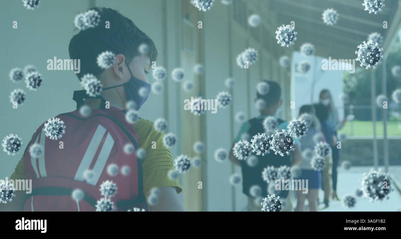 Multiple covid 19 cells floating against school boy wearing face mask ...