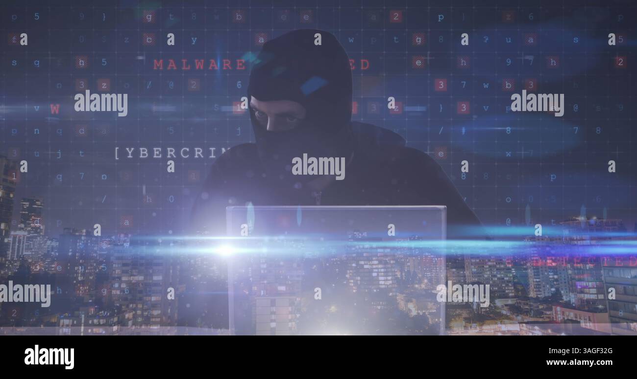 Image of hacker in balaklava using laptop with cyberattack text over cityscape Stock Photo - Alamy