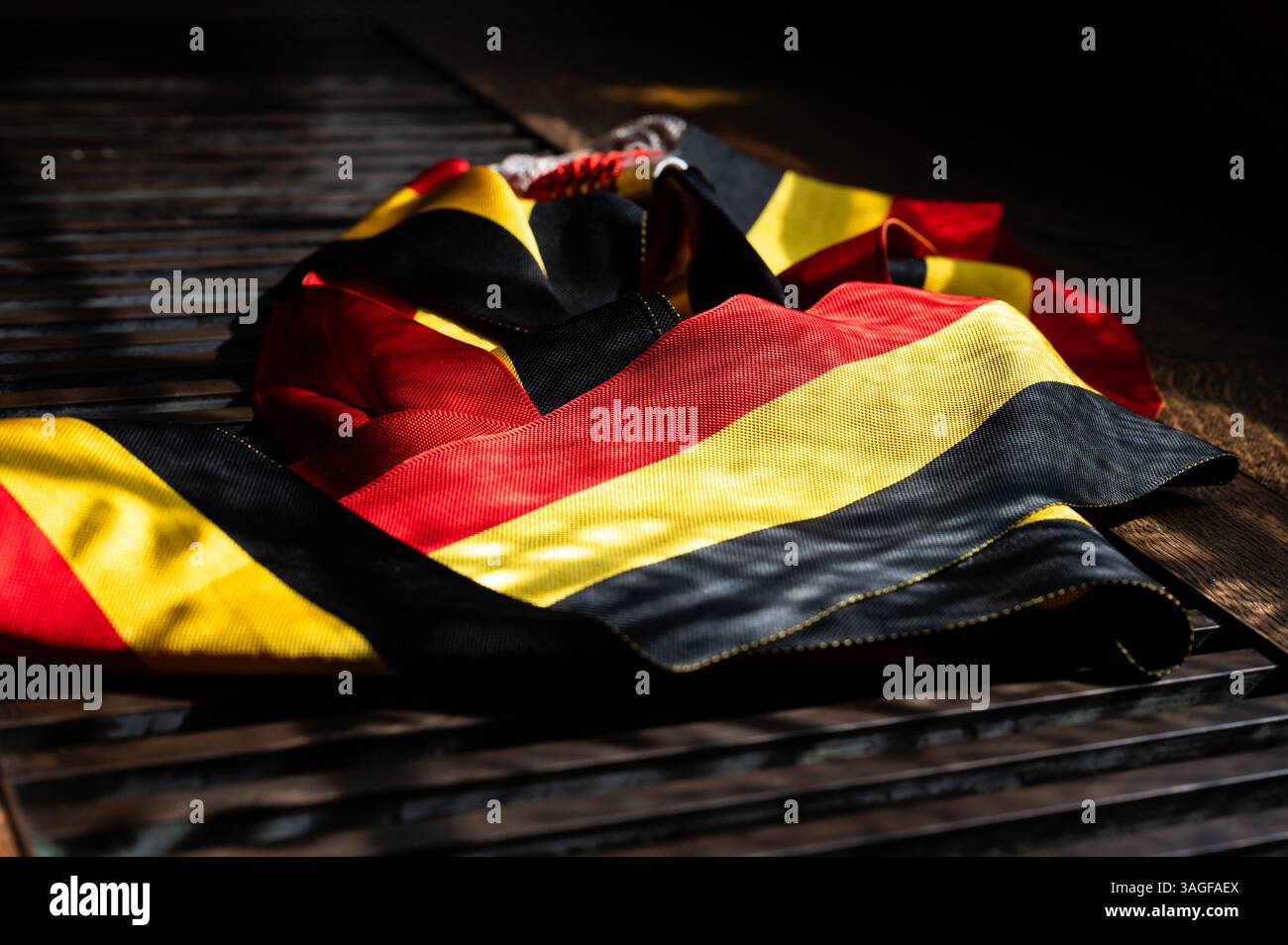 Sash ribbon with Belgian flag tricolor, red yellow, black, a symbol for ...