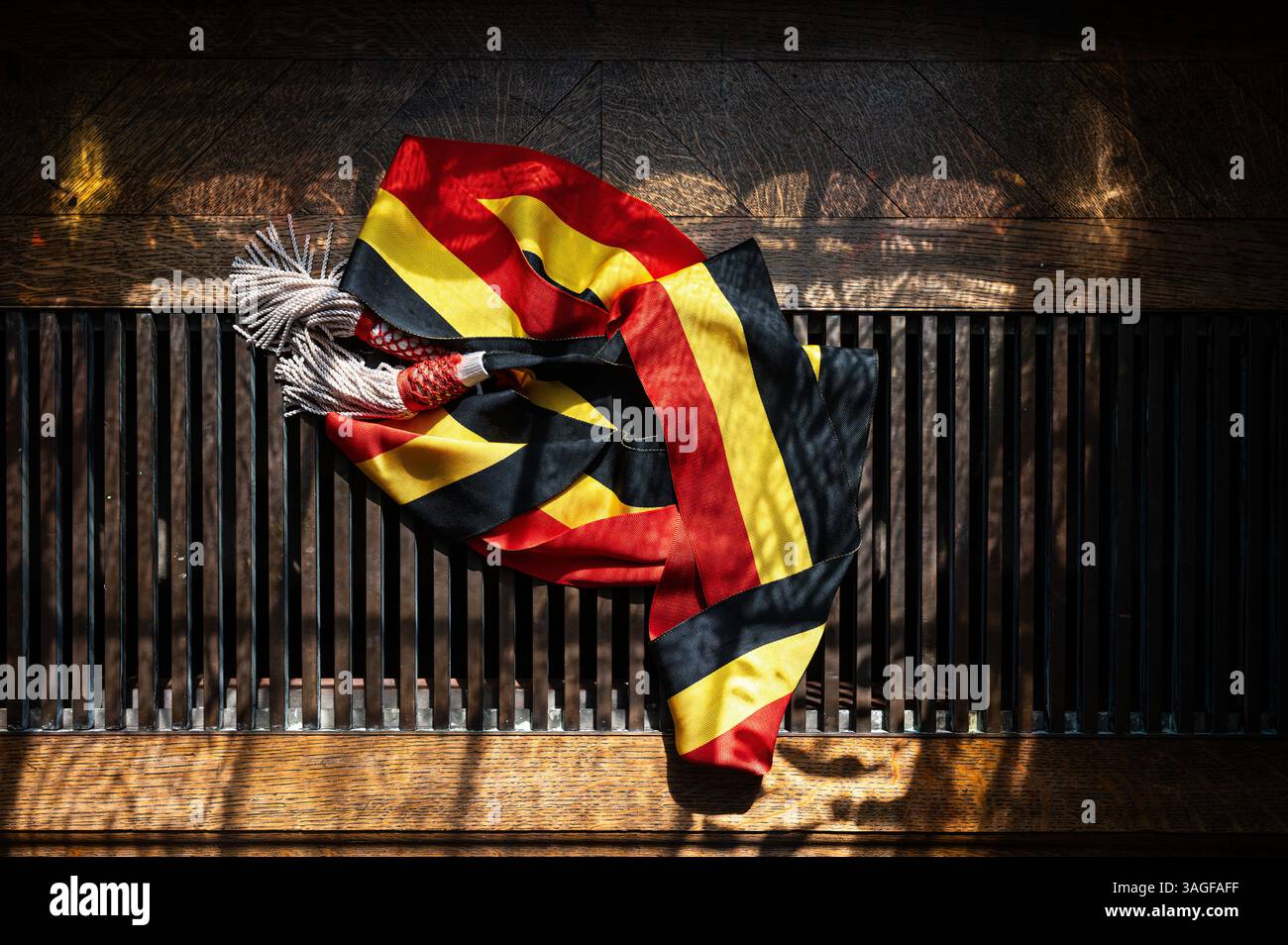 Sash ribbon with Belgian flag tricolor, red yellow, black, a symbol for ...