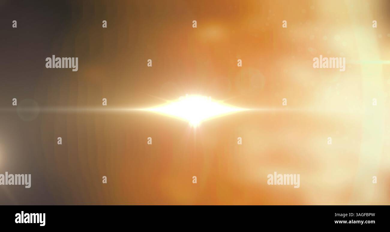 Image of glowing spot on orange background Stock Photo - Alamy