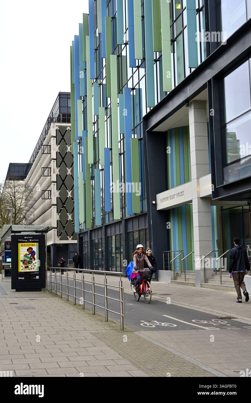 Cyclist ridding in two way cycle path next to pavement Stock Photo - Alamy