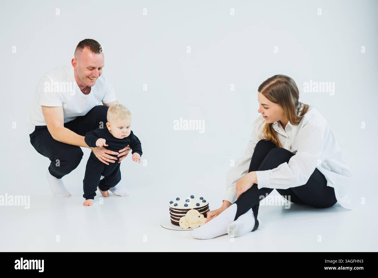 Happy family baby takes first hi-res stock photography and images - Alamy