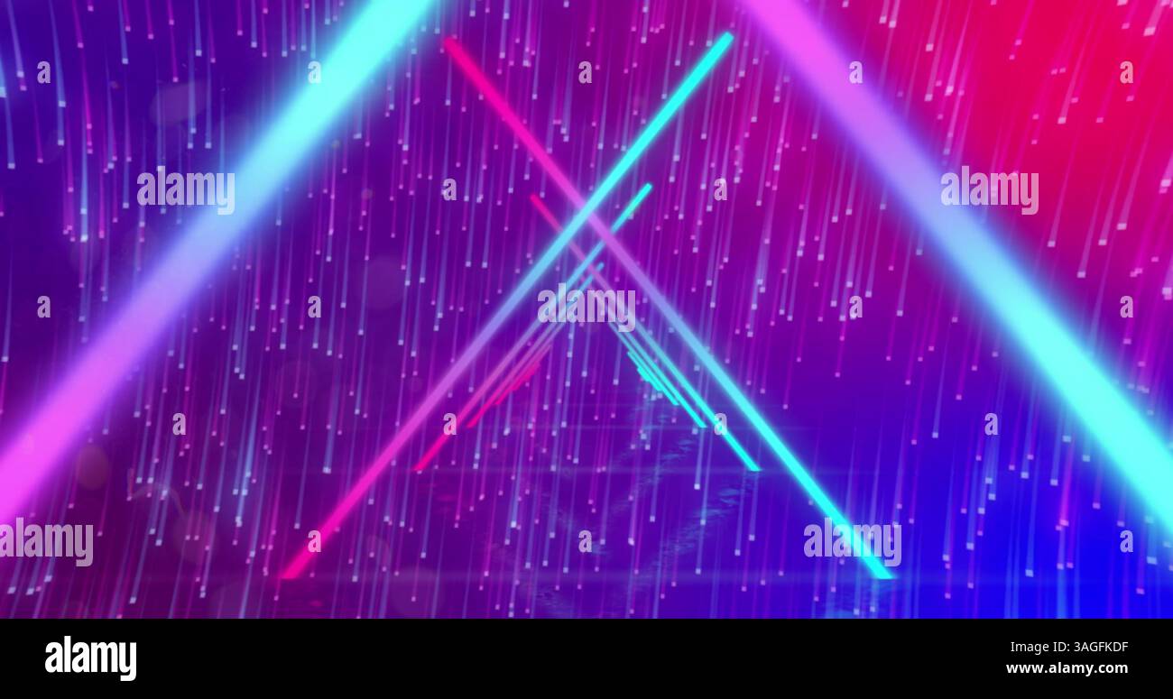 Image of pink and blue light beams, moving over light trails on pink ...