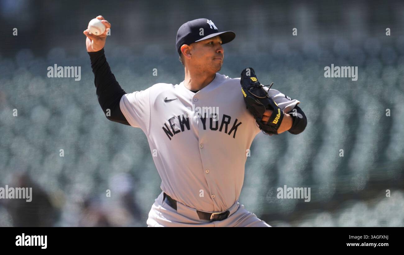 New York Yankees pitcher Carlos Carrasco throws against the Detroit ...