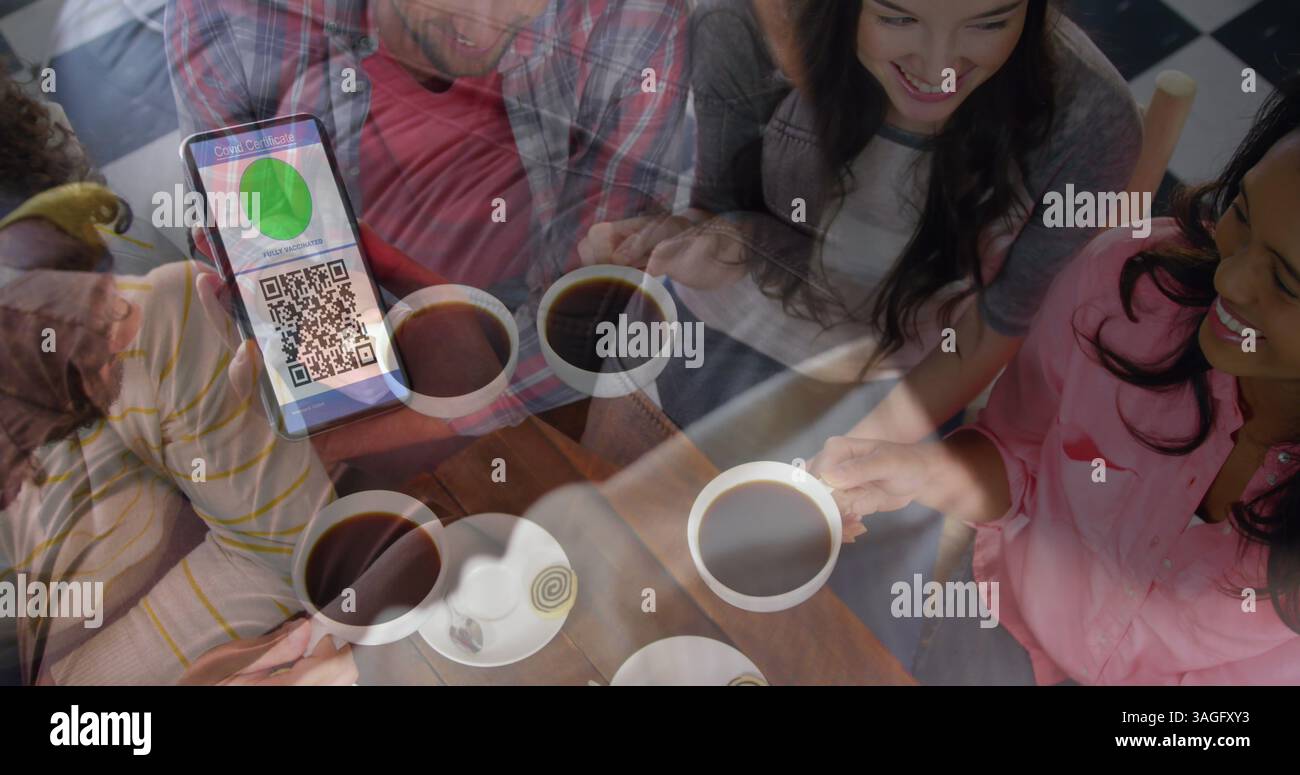 Woman holding a smartphone with qr code on screen against group of ...