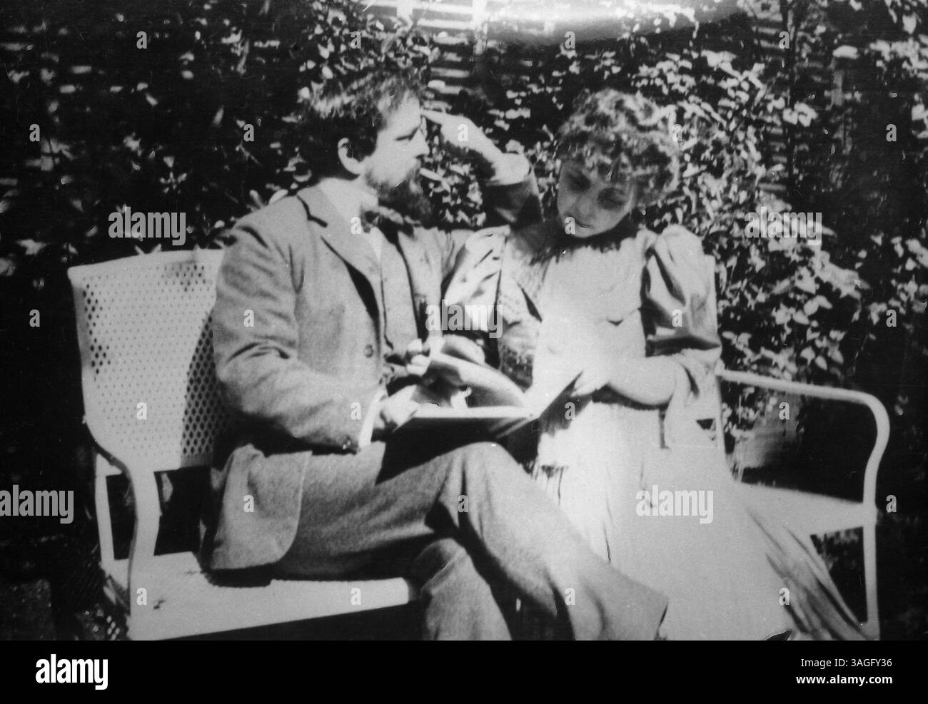 French composer Claude Debussy and his second wife Emma Bardac sitting ...