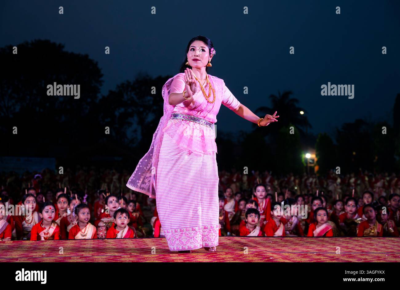 A woman performs Manipuri folk dance at a Bihu dance workshop in Guwahati, India, on April 8 ...
