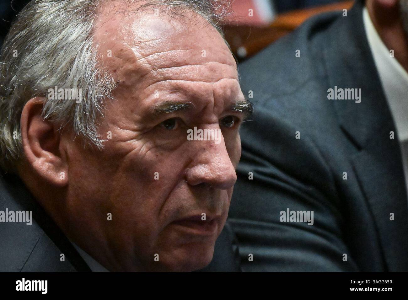 French Prime Minister Francois Bayrou looks on during a session of ...
