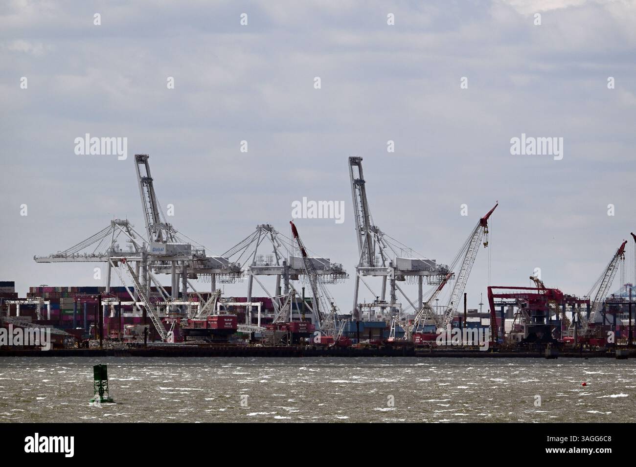 Cranes used to load and offload container ships at Port Jersey ...