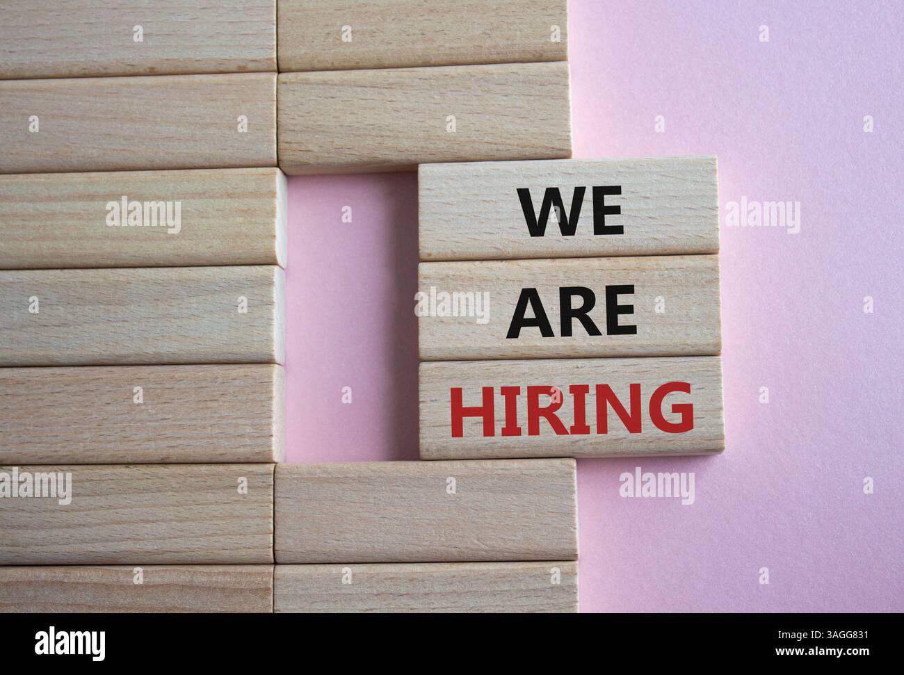 We are Hiring symbol. Concept words We are Hiring on wooden blocks ...
