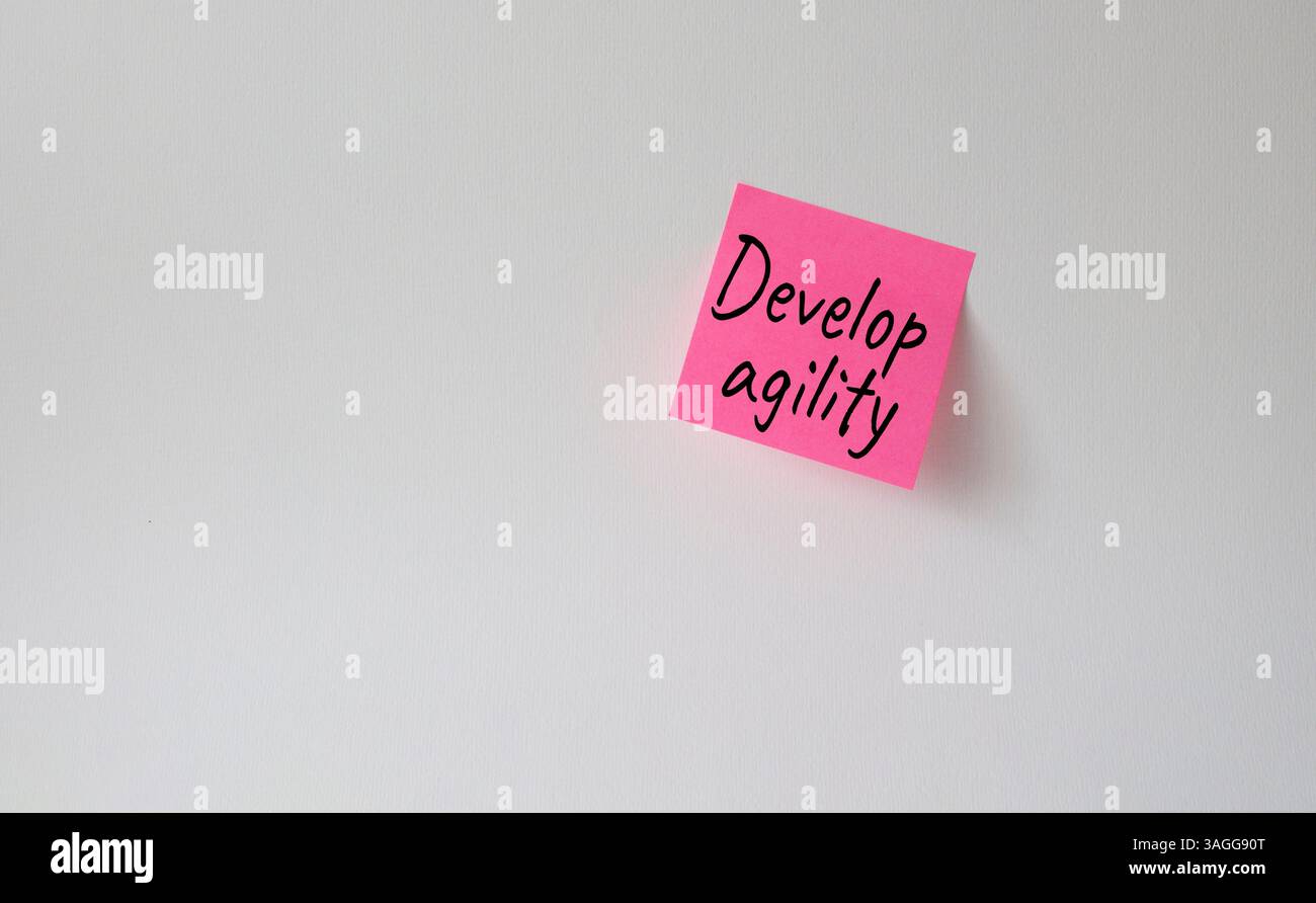 Develop agility symbol. Pink steaky note with concept words Develop ...