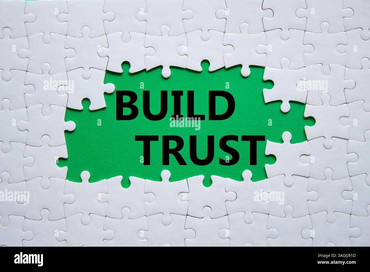Build trust symbol. White puzzle with words Build trust. Beautiful ...