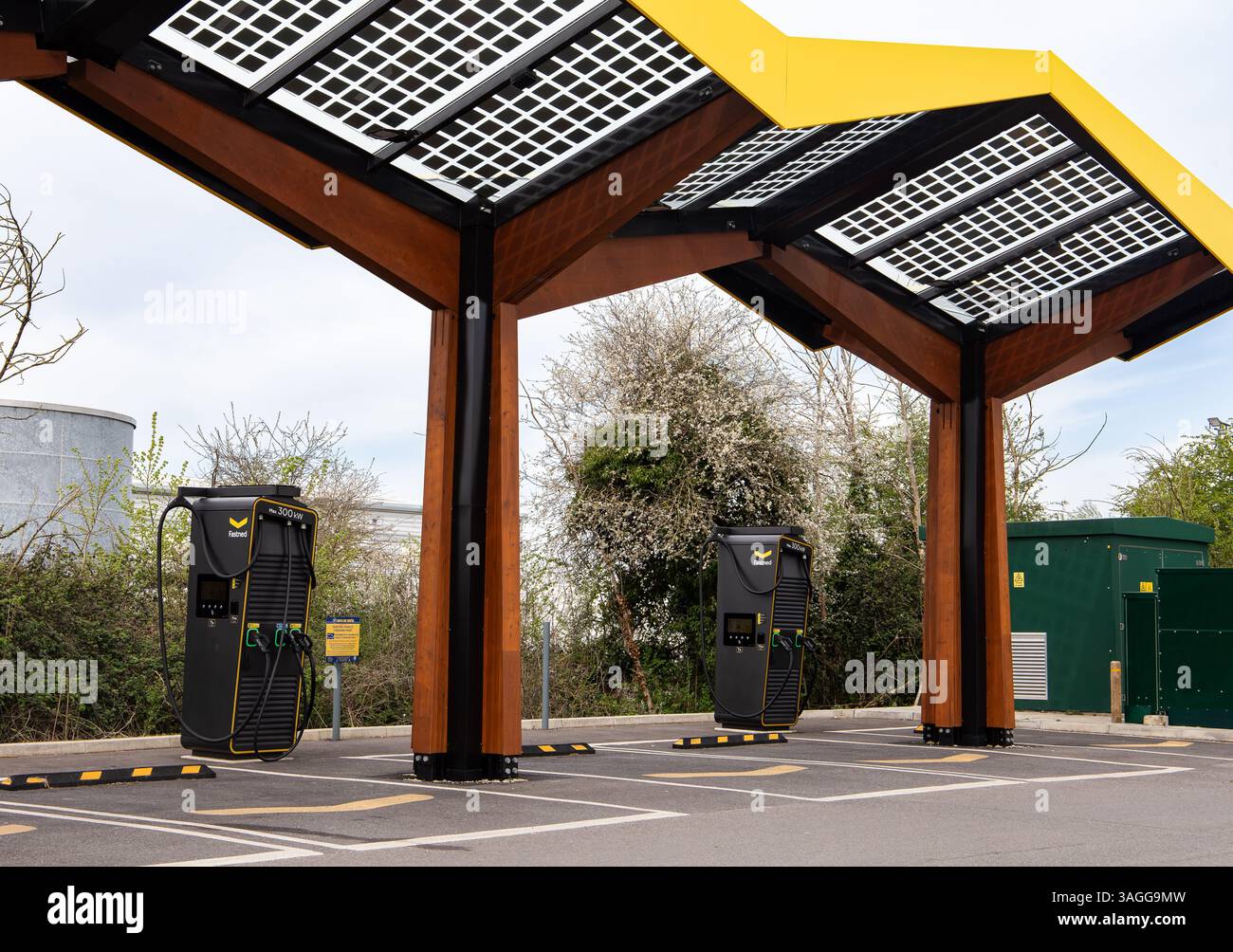 Outdoor charging station with solar canopy over two electric vehicle ...