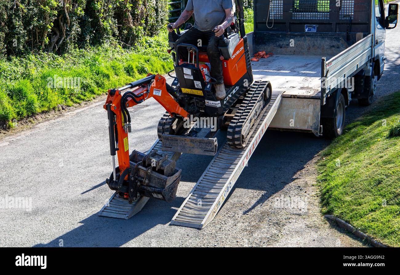 Small construction vehicle operates hi-res stock photography and images ...