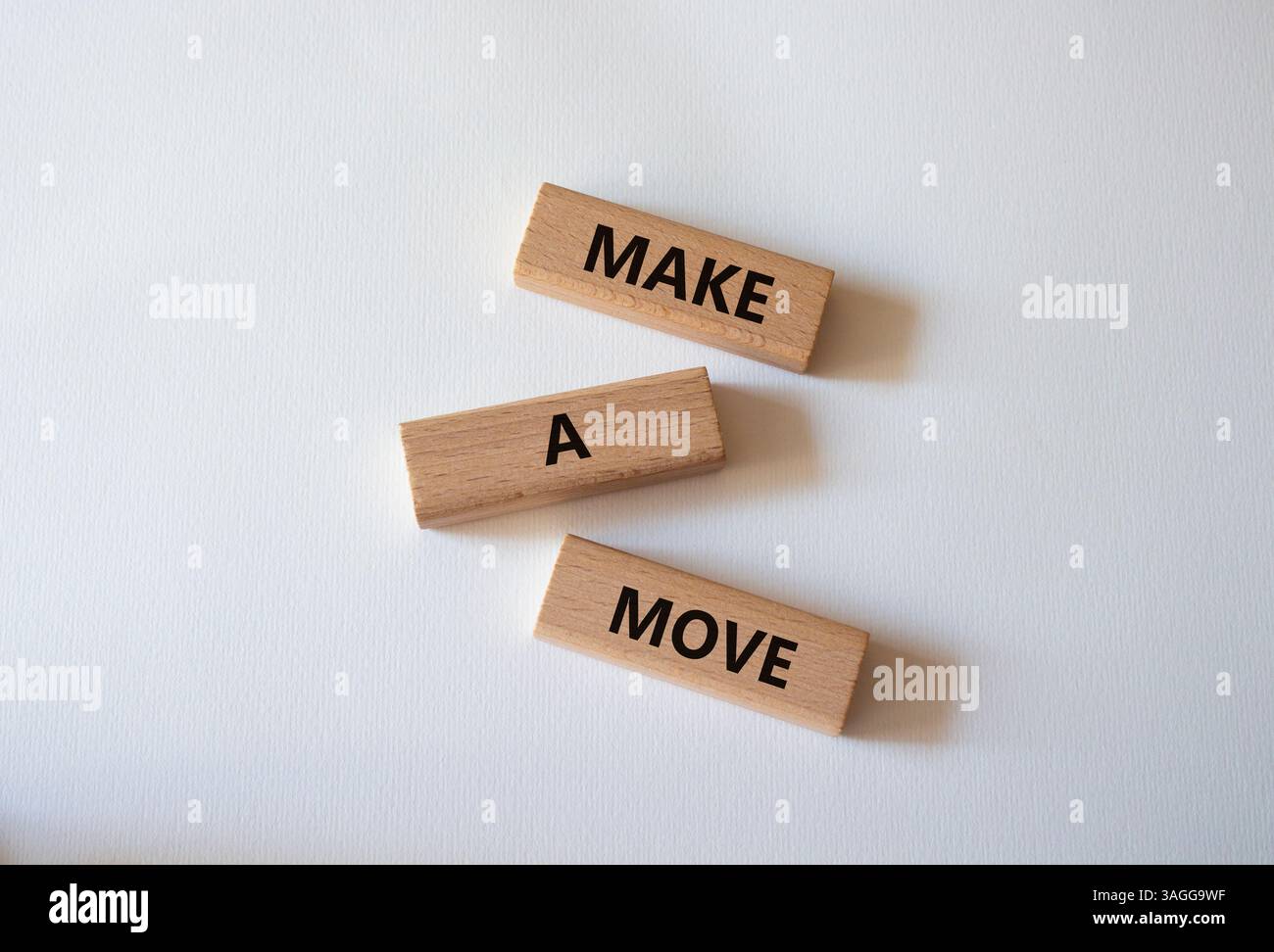 Make a Move symbol. Concept words Make a Move on wooden blocks ...