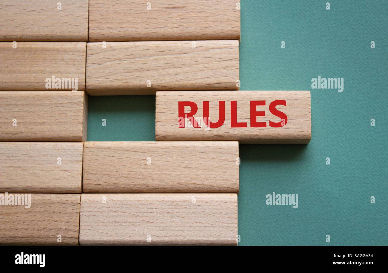 Rules symbol. Wooden blocks with word Rules. Beautiful grey green ...