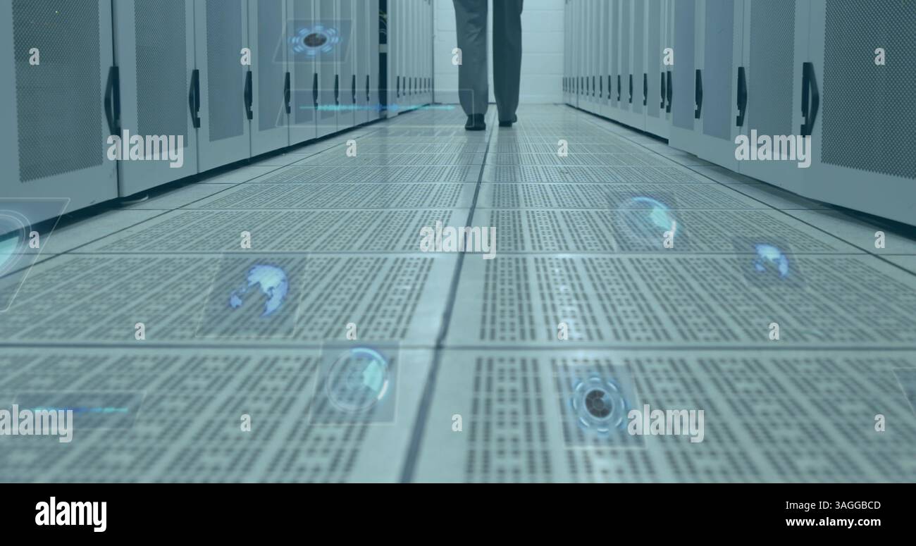 Multiple round scanners against mid section of man walking in computer server room Stock Photo ...