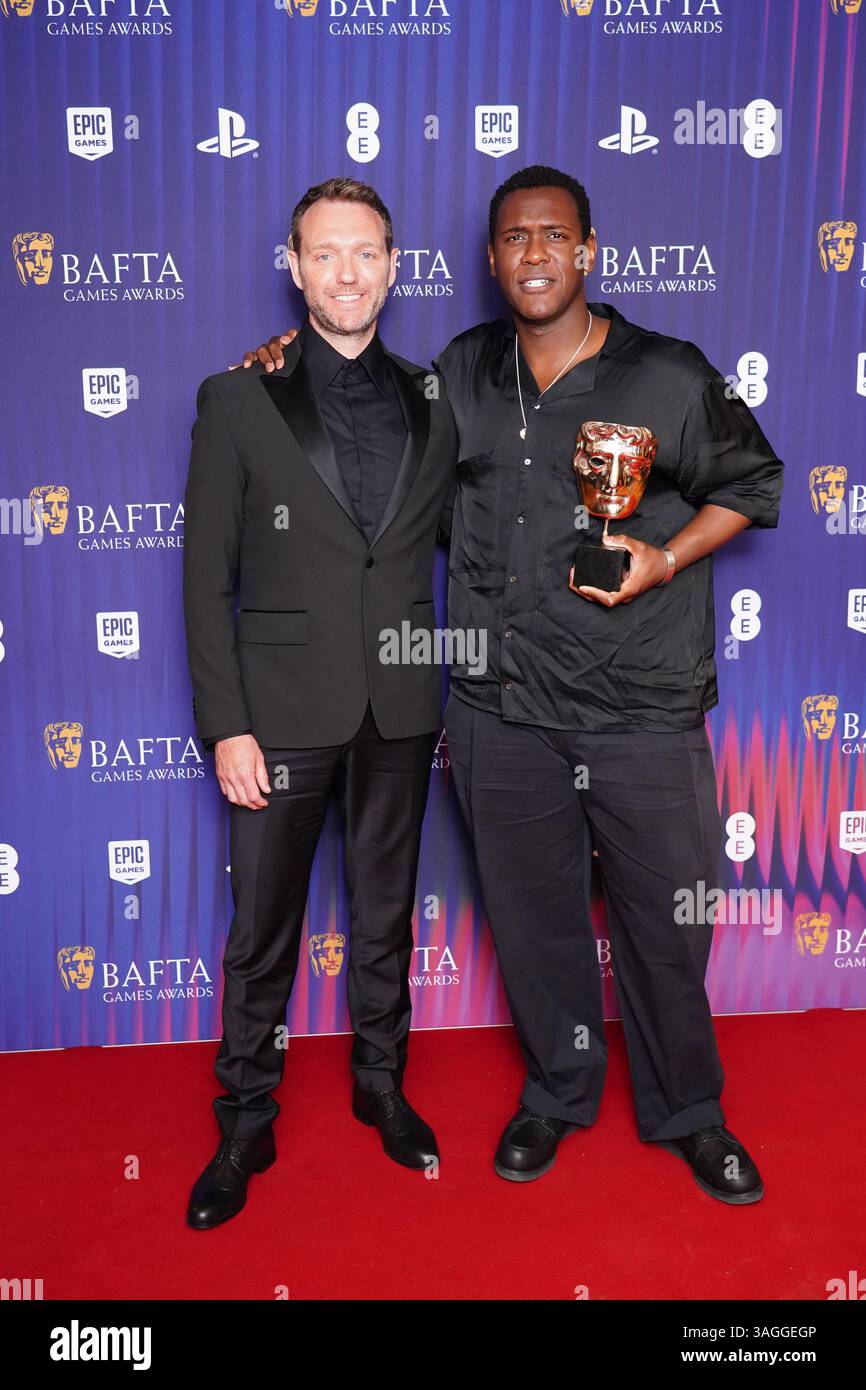 Presenter Tom Kay with Abubakar Salim, winner of the Game Beyond ...