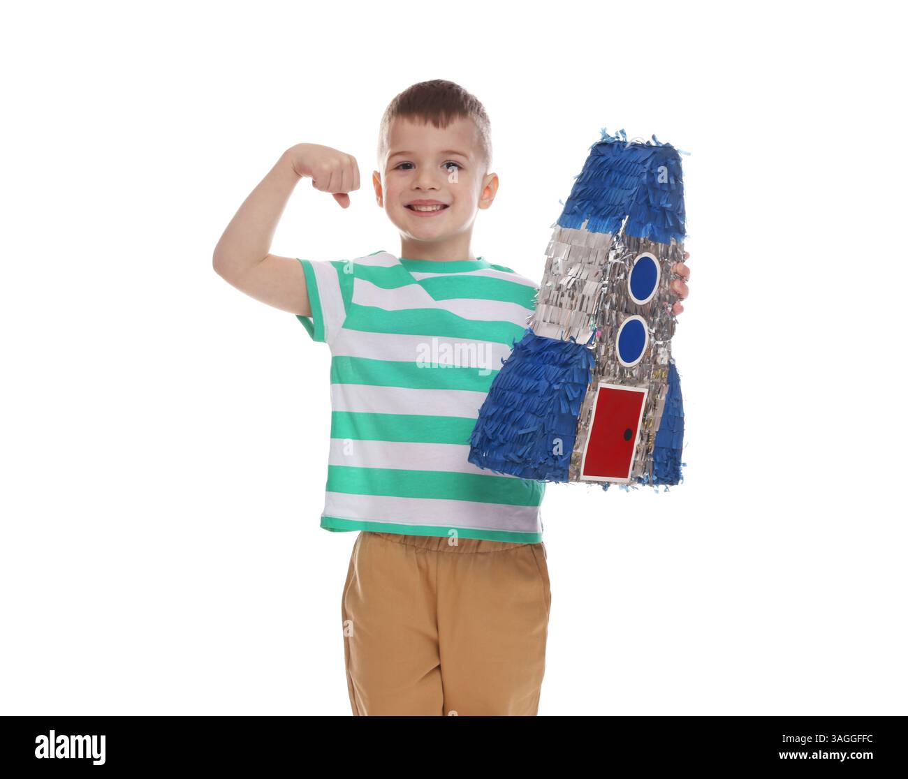 Happy boy with rocket shaped pinata on white background Stock Photo - Alamy