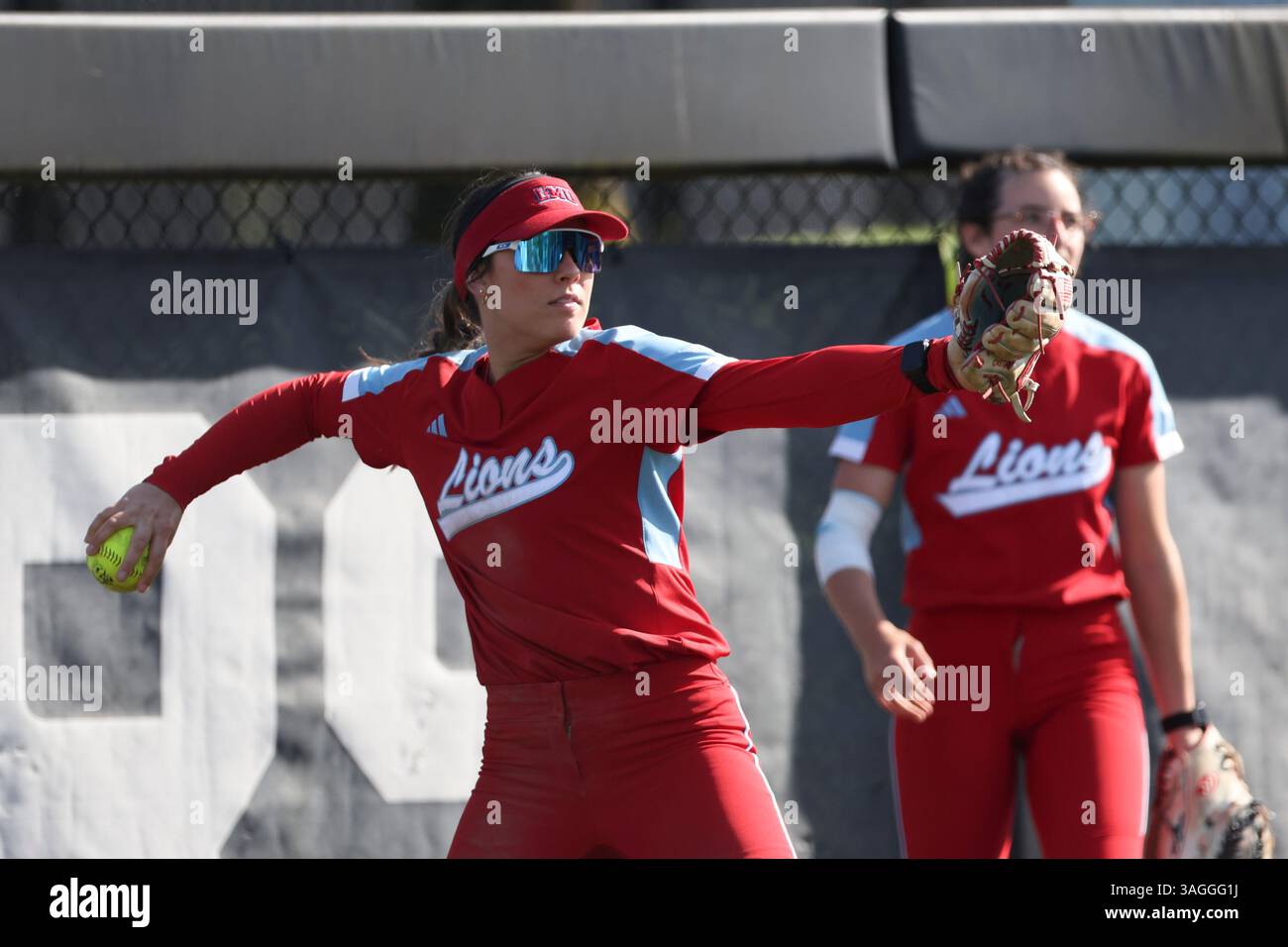 Loyola Marymount outfielder Kealani Caster (17) throws during an NCAA ...