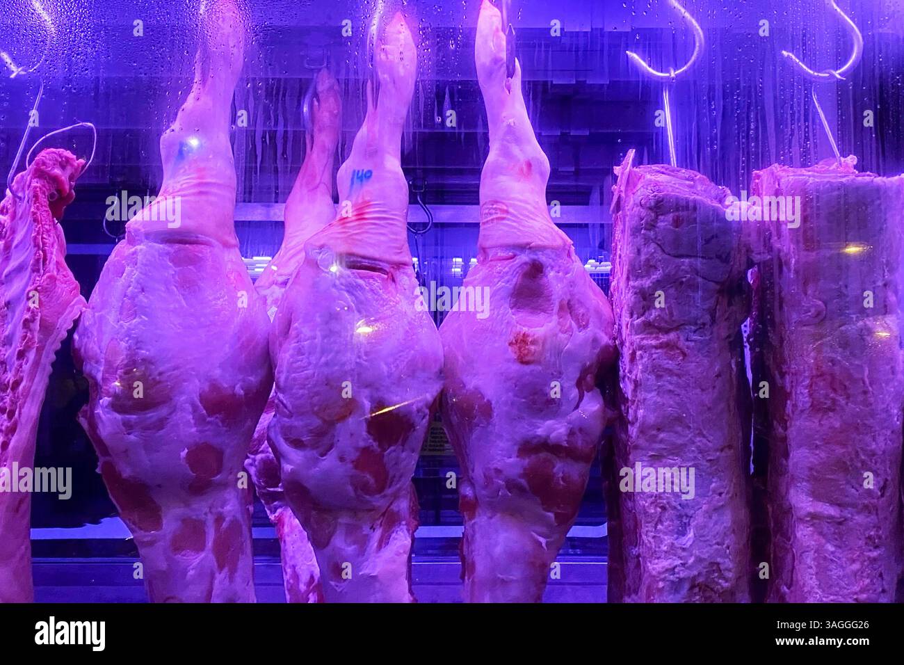Hanging fresh meat in a butcher shop, closeup photo Stock Photo - Alamy