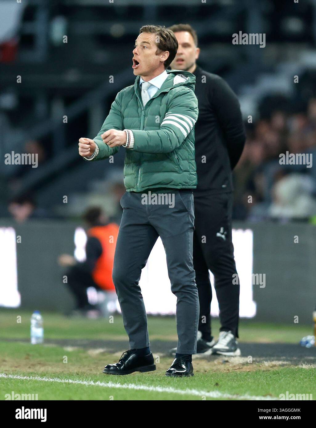 Burnley manager Scott Parker (left) and Derby County manager John ...