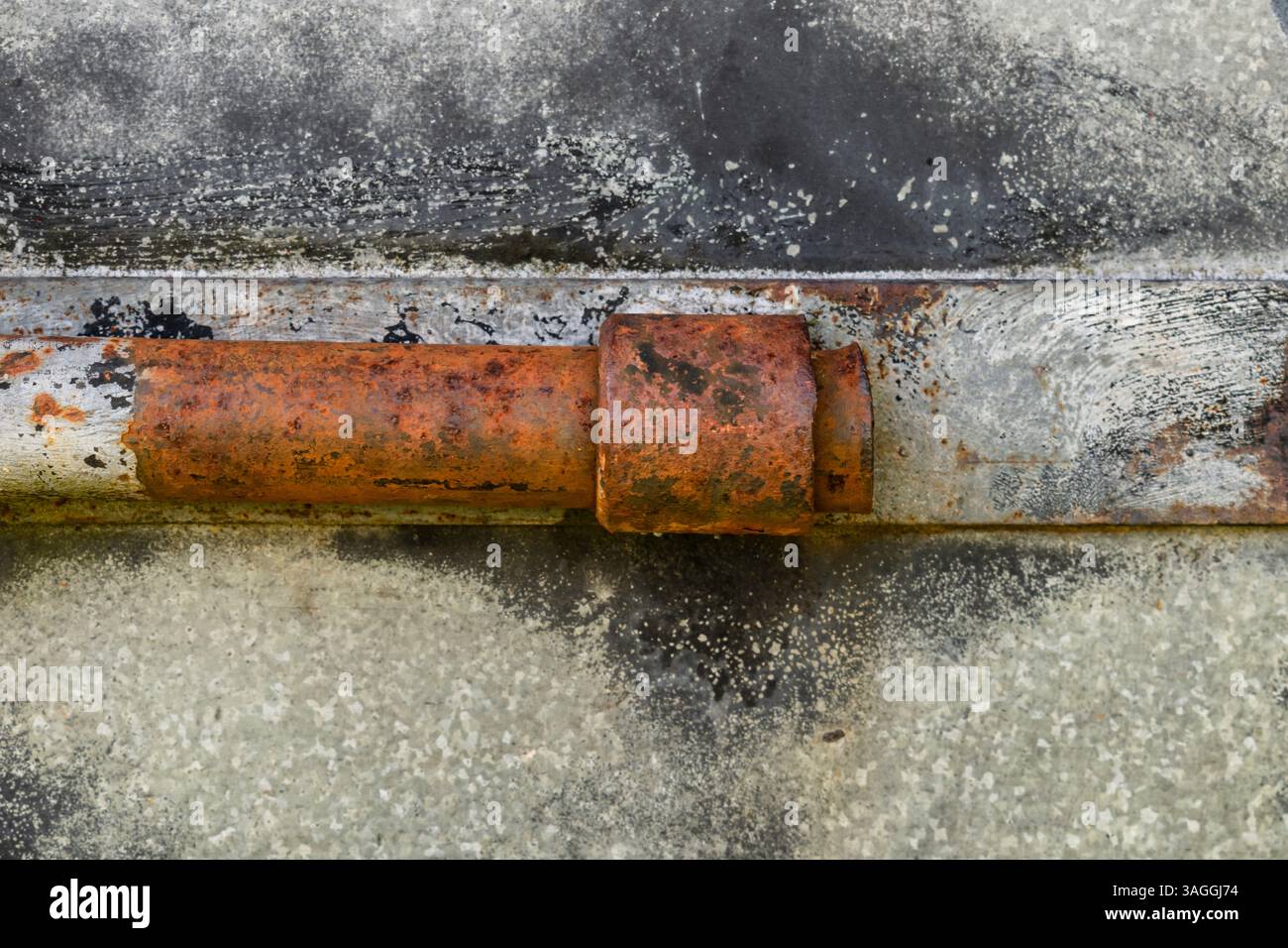 Rusty bolt on damaged metal door Stock Photo - Alamy