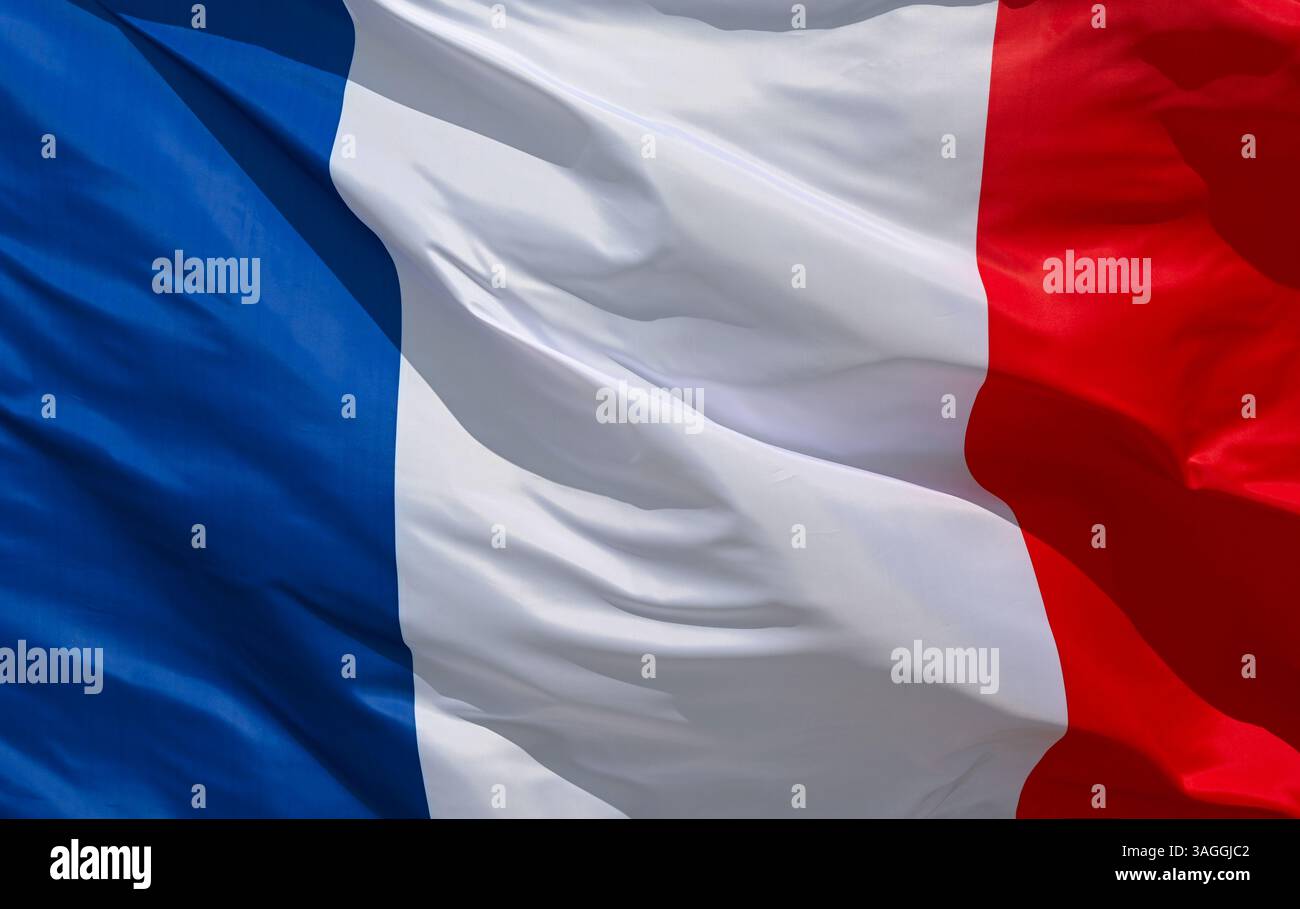 French flag fluttering in the wind, showing the characteristic blue ...