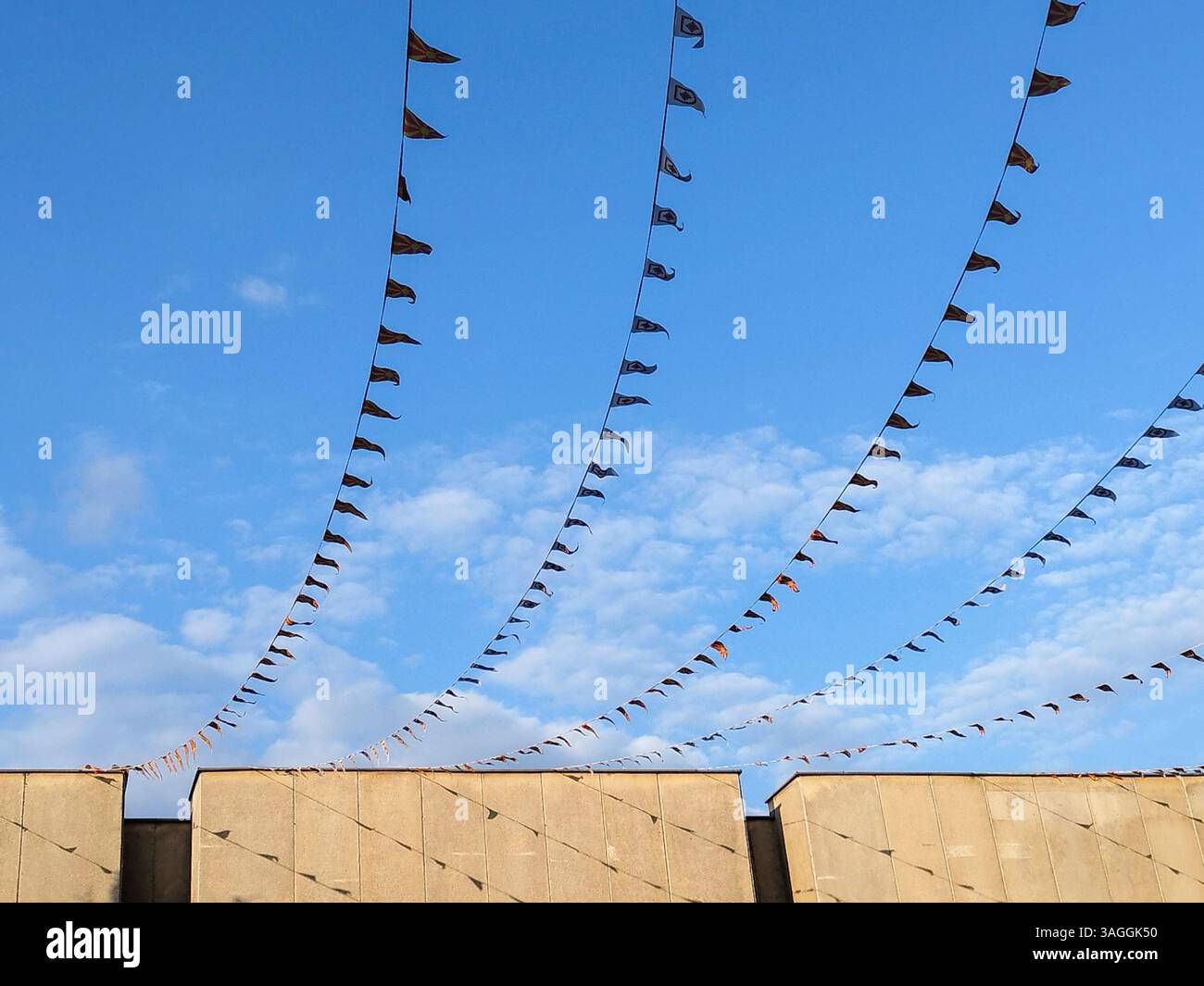 Dancing in the Wind: Sky Banners and Tiny Flags Stock Photo - Alamy