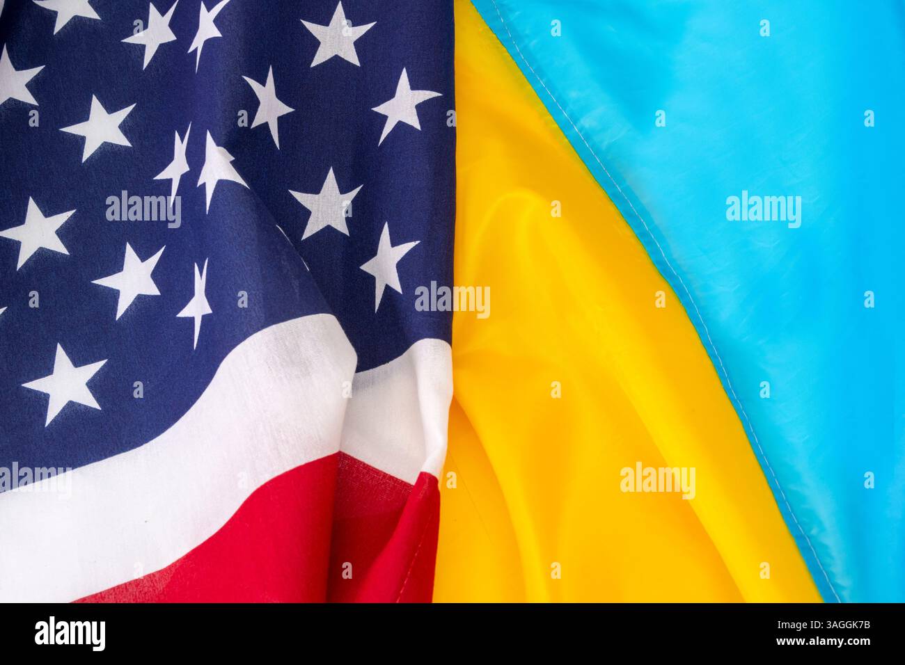 The flag of Ukraine and the flag of America are connected together ...