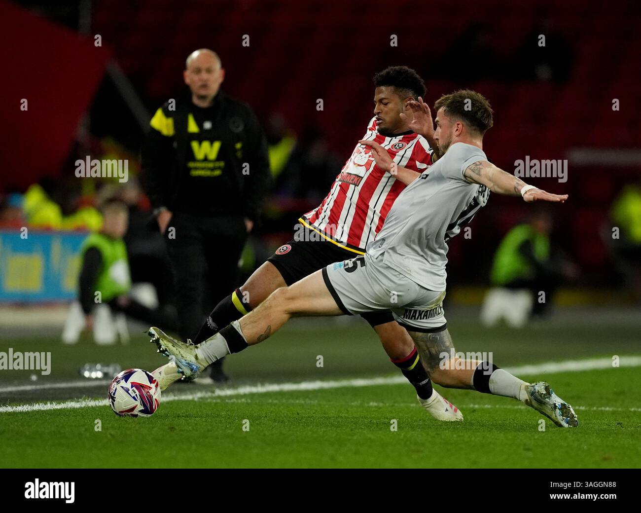 Sheffield United's Rhian Brewster (left) and Millwall's Joe Bryan ...